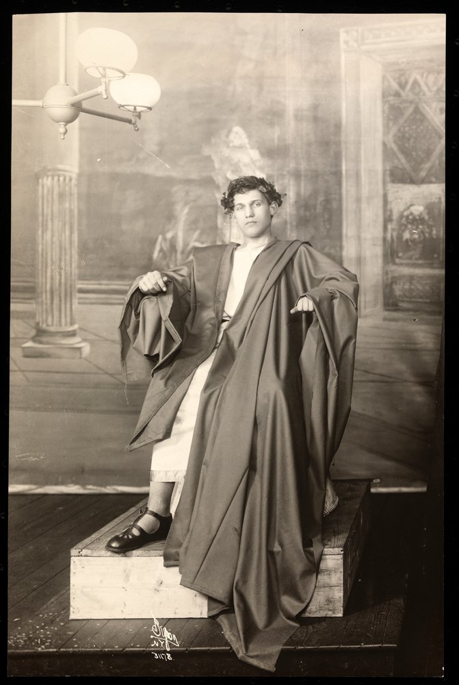A young actor in the costume of Julius Caesar of the set of an amateur production of Julius Caesar